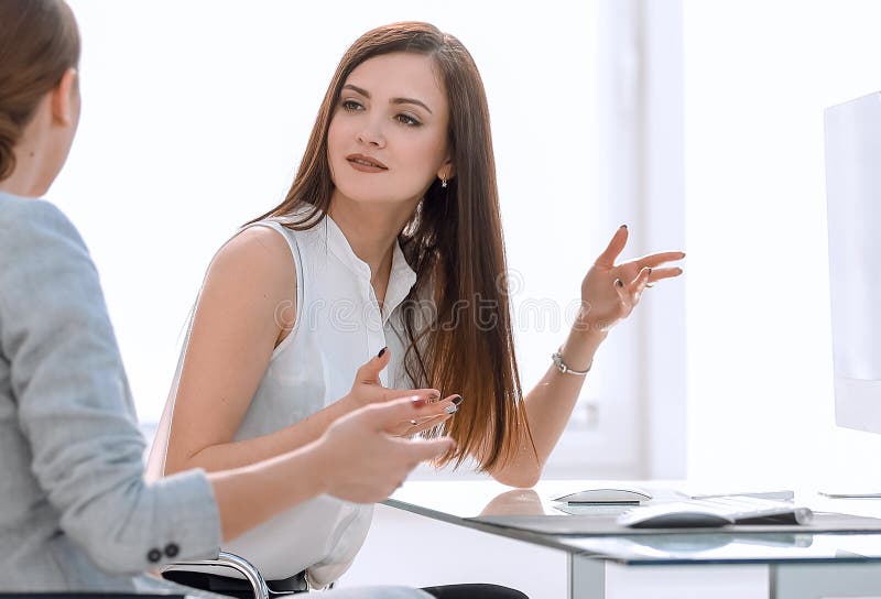 Two Office Workers Talking in the Workplace Stock Photo - Image of ...