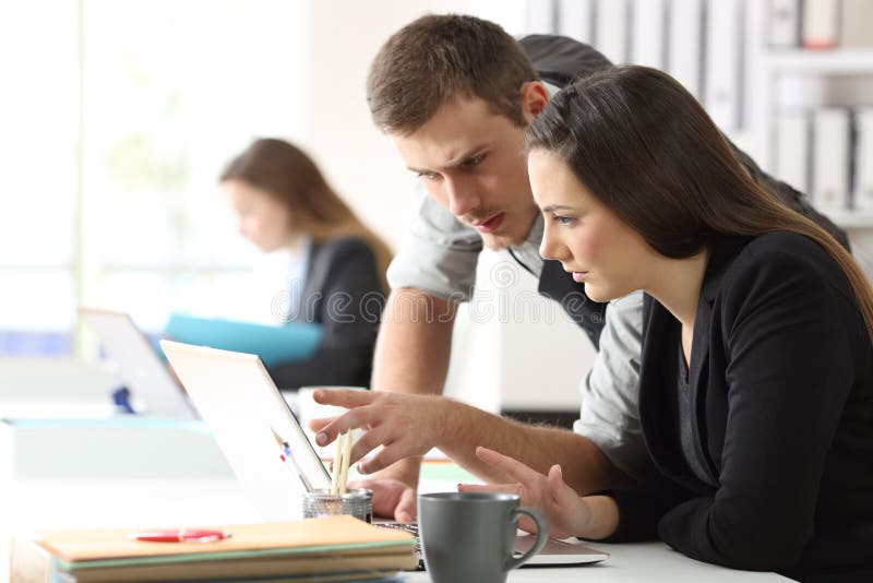 Two Office Workers Coworking on a Desktop Stock Image - Image of desk ...