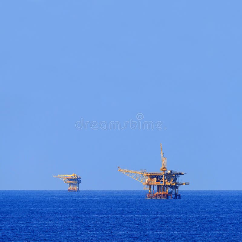 Two Offshore Production Platforms for Oil and Gas Stock Photo - Image ...