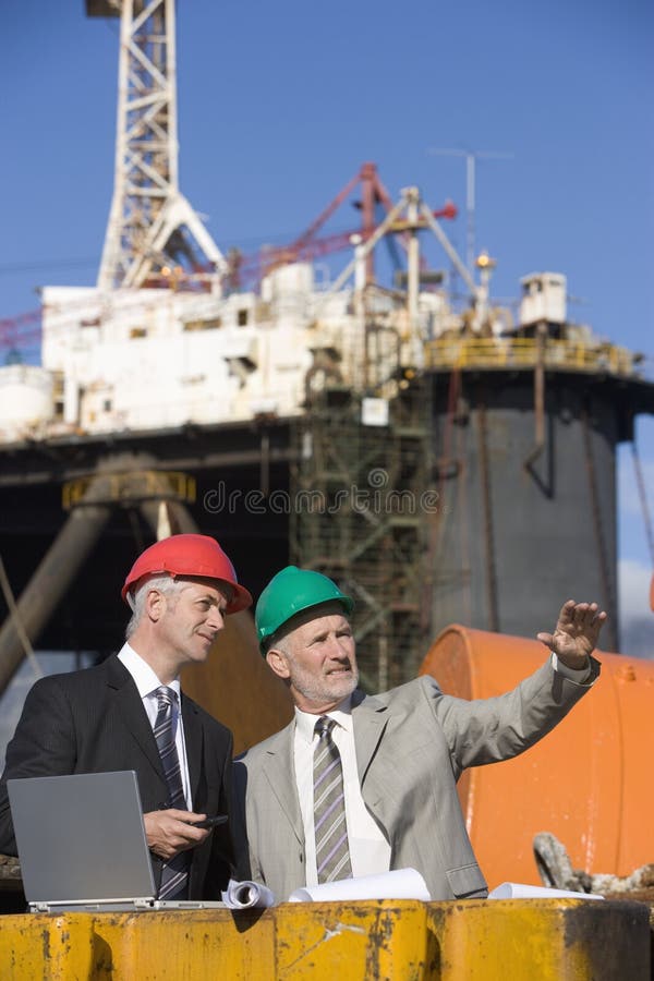 Oil rig inspectors stock photo. Image of toughness, occupation - 2796696