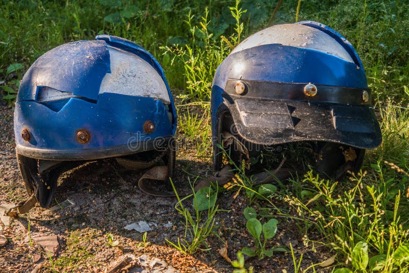 Two Old Broken Motorcycle Helmet Stock Image - Image of spring, floor ...