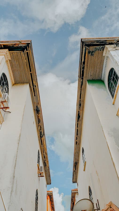 Between two old buildings stock image. Image of look - 247965615