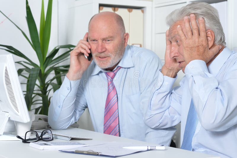 Two Old Business Men Sitting at Desk and Working Stock Photo - Image of ...