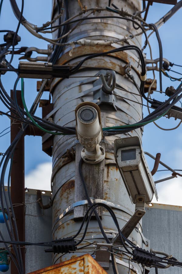 Two Old Cctv Security Surveillance Cameras on Street Light Pole on Blue ...