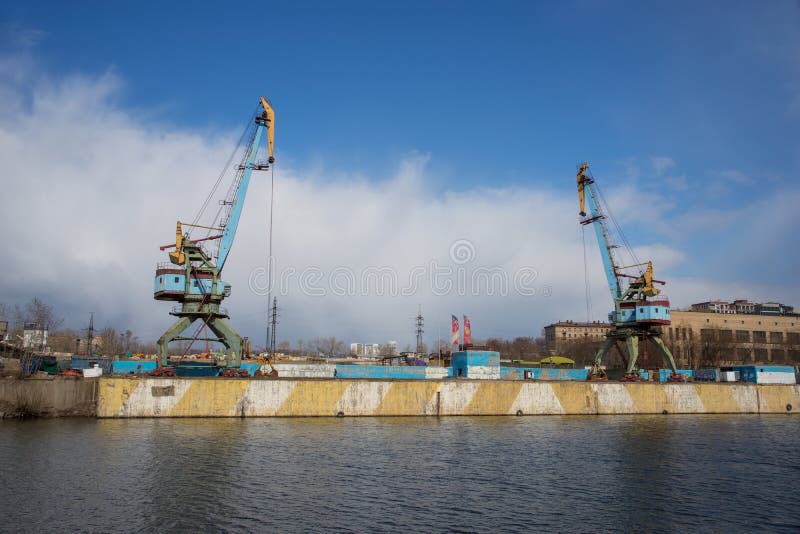 Two Old Crane Loading Cargo in the River Port Stock Image - Image of ...