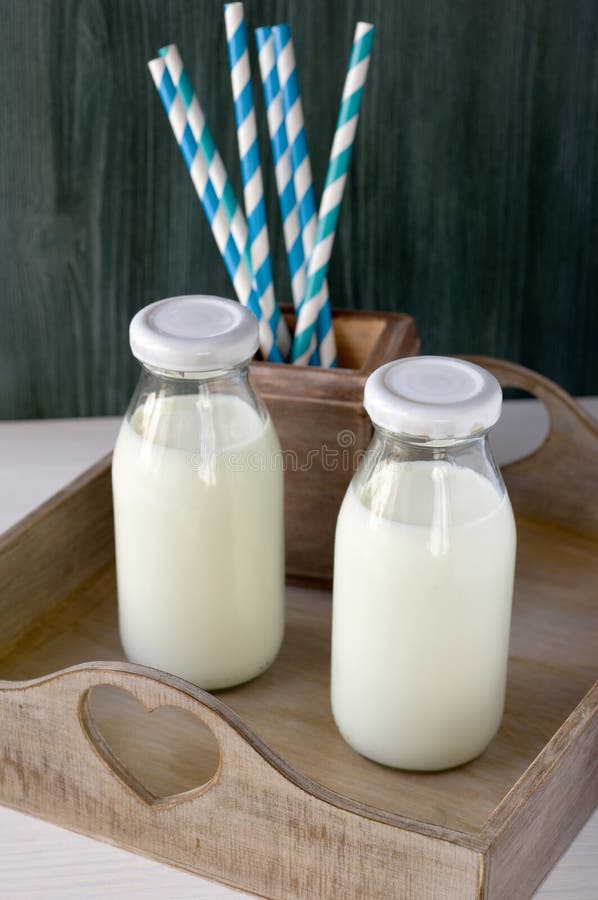 Two Old Fashioned Milk Bottles Stock Photo - Image of traditional ...