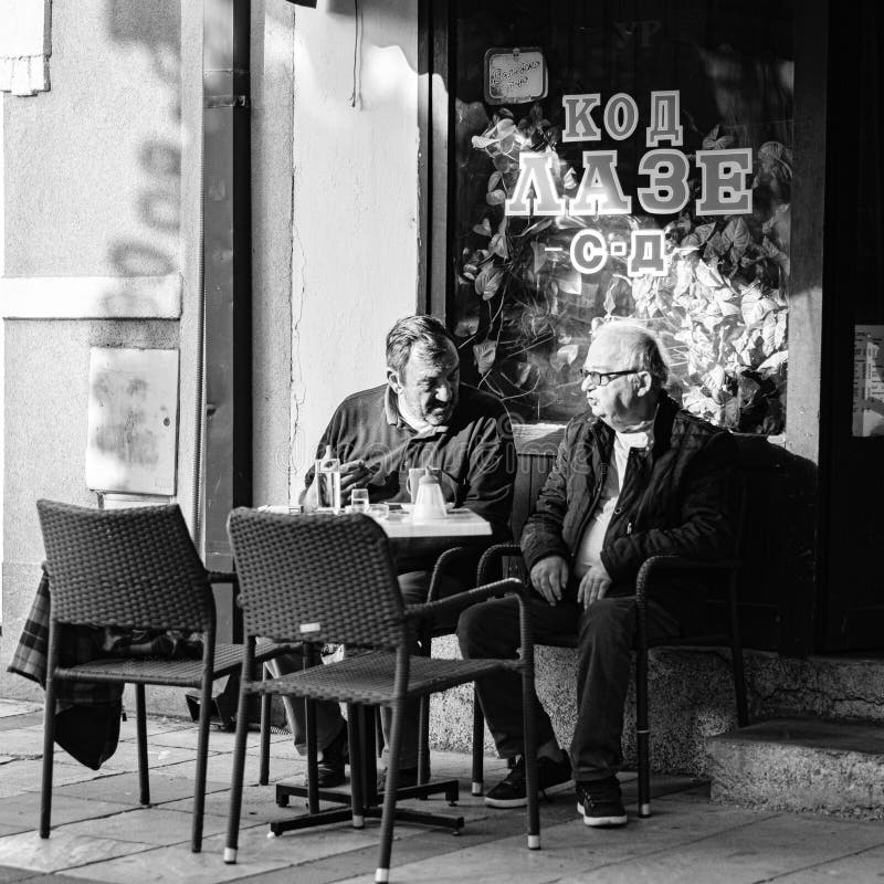 Two Old Men Chatting in Front of the Coffee Store Editorial Stock Photo ...