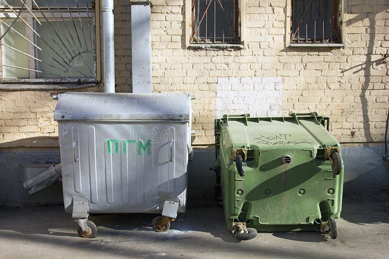 Two Trash Dumpsters stock image. Image of lifestyle, dirty - 35341411