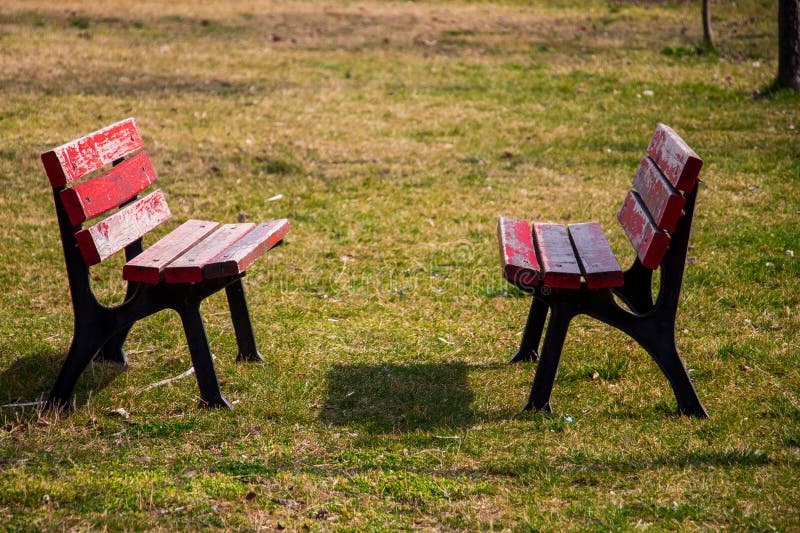 Two Old, Red-coloured Benches Standing Opposite Each Other Stock Photo ...