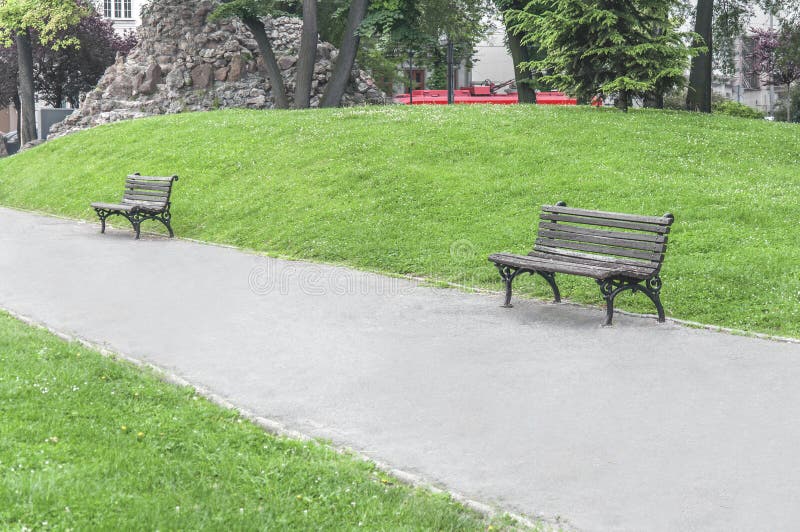 Two Old Rusty Bench in the Park in the City Center Stock Photo - Image ...