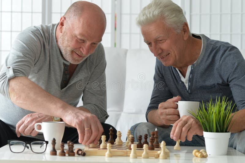Two Old Senior Men Playing Chess at Home Stock Photo - Image of relaxed ...