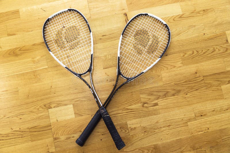 Two Old Squash Rackets Lie on a Parquet Background. Minsk, Belarus- May ...
