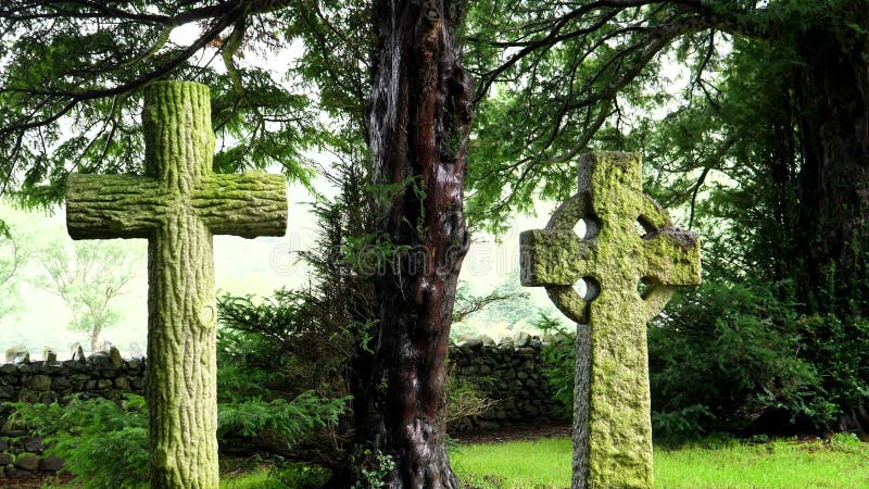 Two Old Stone Crosses Under the Trees in Summer Stock Footage - Video ...