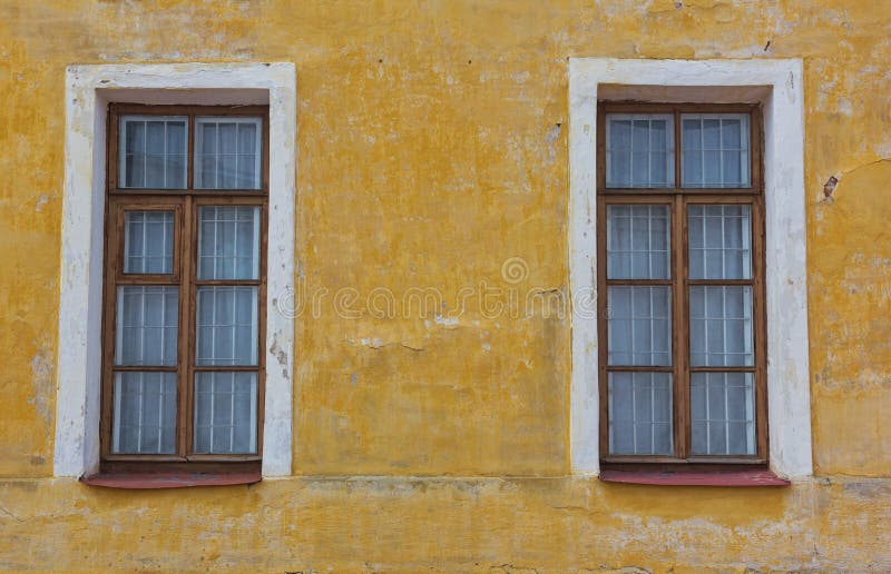 Two Old Windows on the Yellow Wall Stock Image - Image of ancient ...