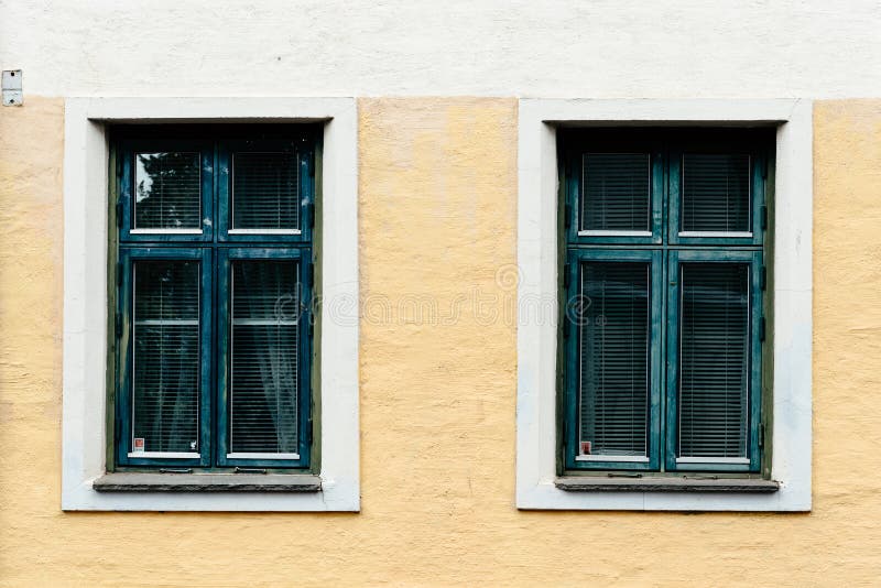 Two Old Wooden Windows Painted in Green on Stucco Facade Stock Photo ...