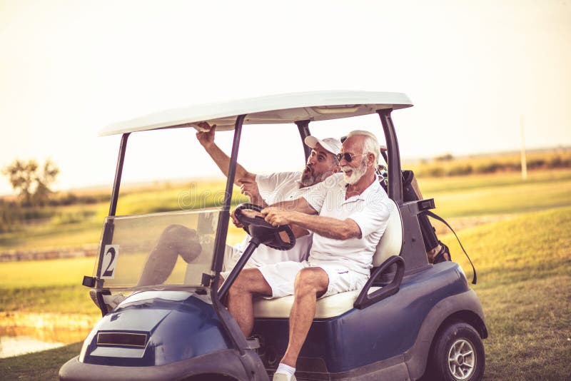 Happy Older Friends are Riding in a Golf Cart Stock Image - Image of ...