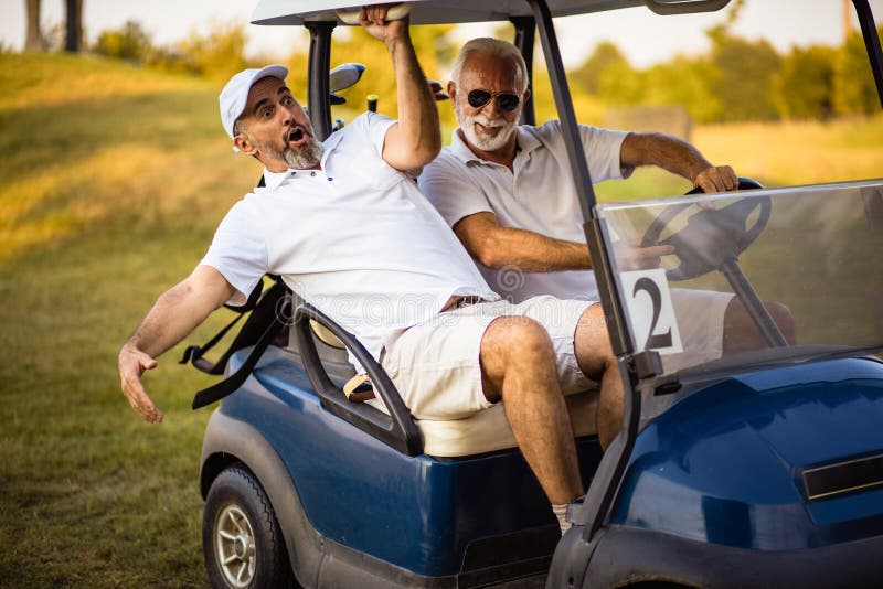 Older Friends are Riding in a Golf Cart Stock Image - Image of ...