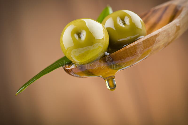 Two olives and leaves stock image. Image of leaf, green - 55387487