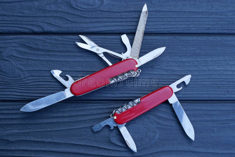 Two Open Folding Knives Multitools with Red Handles with Gray Blades ...