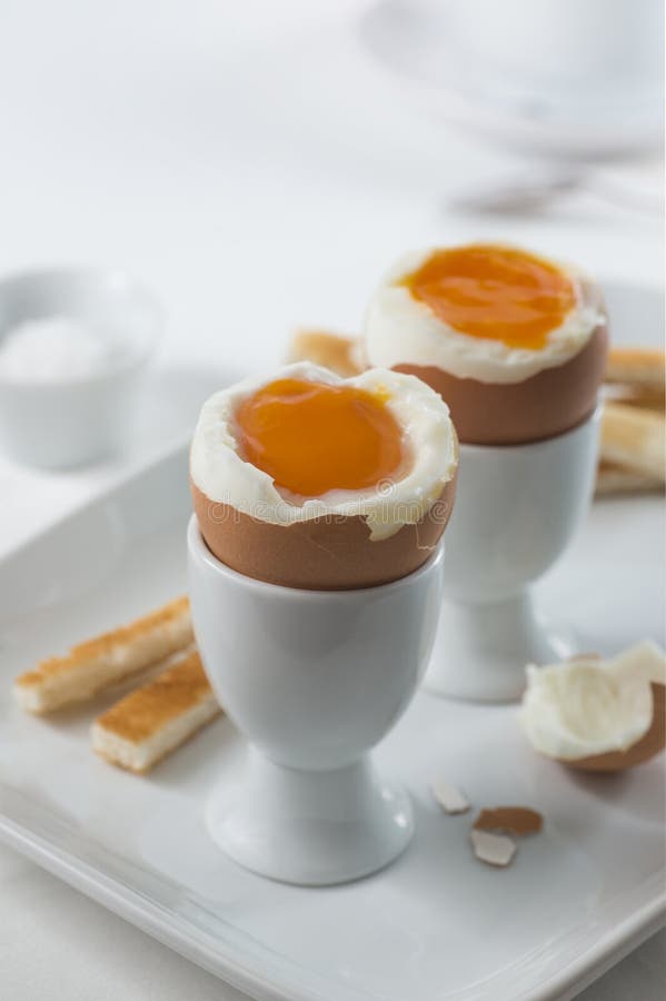 Two open soft boiled eggs stock image. Image of catering - 40751465