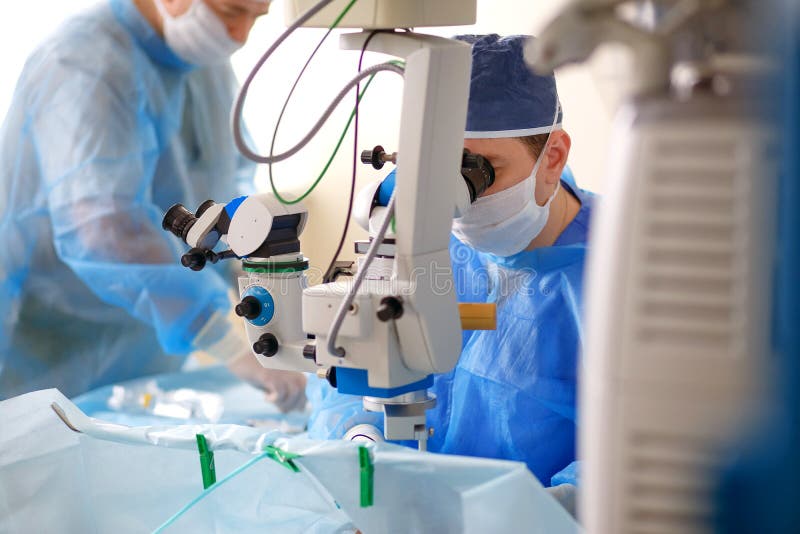 Two Ophthalmologist Perform an Operation in the Operating Room ...
