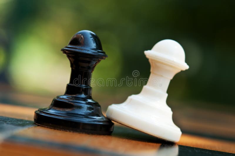 Two opposing pawns stock photo. Image of objects, concept - 26219166