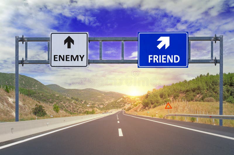 Two Options Enemy and Friend on Road Signs on Highway Stock Photo ...