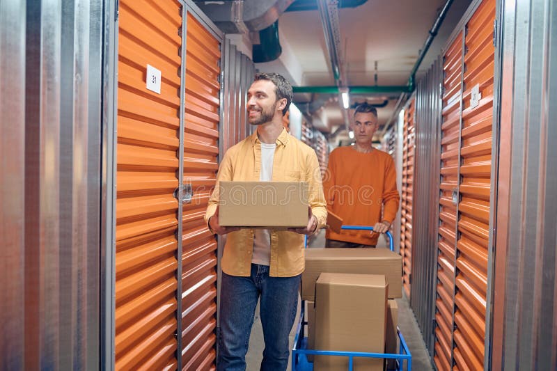 Two Order Pickers Picking Ordered Items for Customers Stock Photo ...