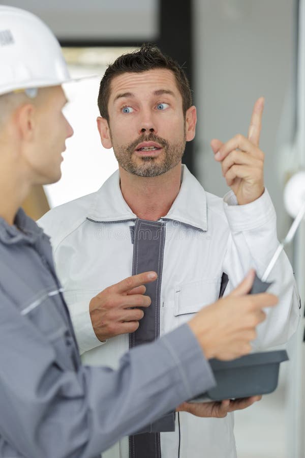Two Painter Watching Apprentice Working Stock Image - Image of satisfy ...