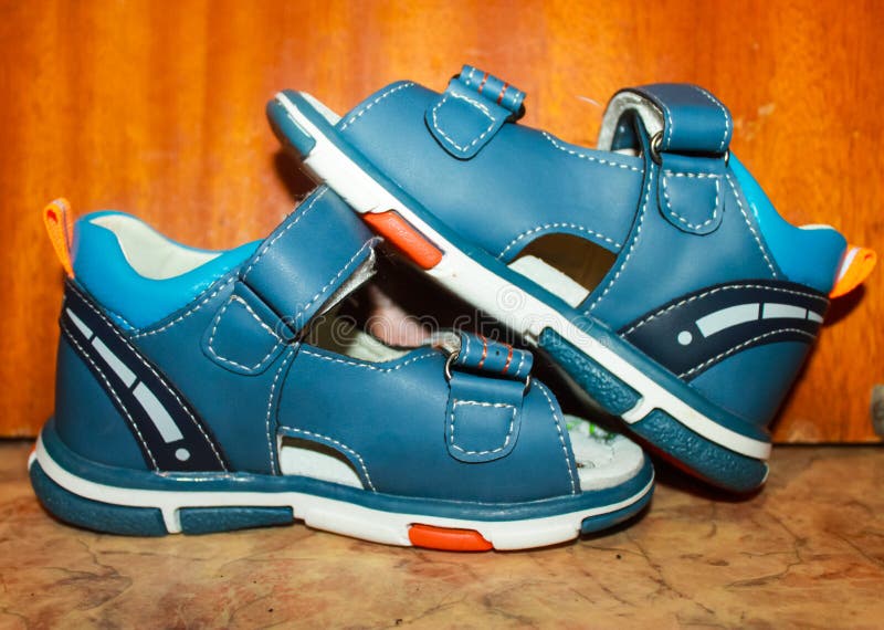 Two Pairs of Blue Children S Shoes Stock Photo - Image of yellow ...