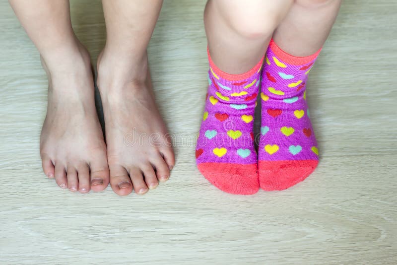 Two Pairs of Children Legs Closeup with Socks Stock Image - Image of ...