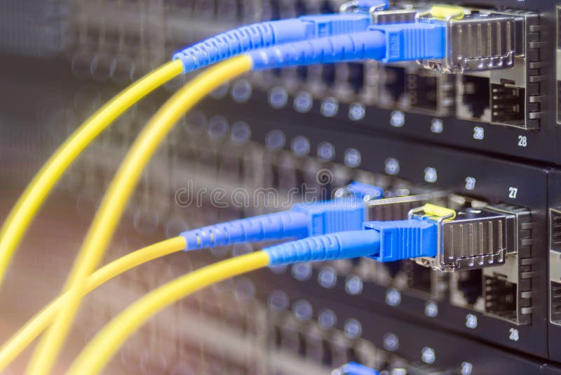 Two Pairs of Fiber Optic Patch Cords are Connected To a Manageable ...