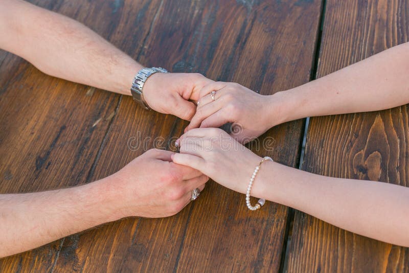 Two Pairs of Hands Holding Each Other. Stock Photo - Image of holding ...