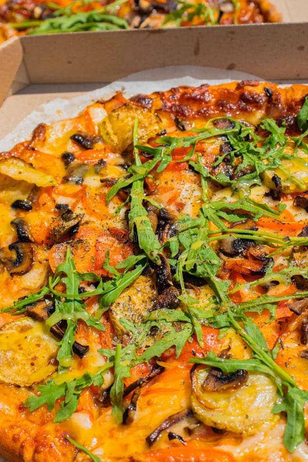 Two Pan Pizzas in Two Pizza Boxes with Their Two Different Flavors ...