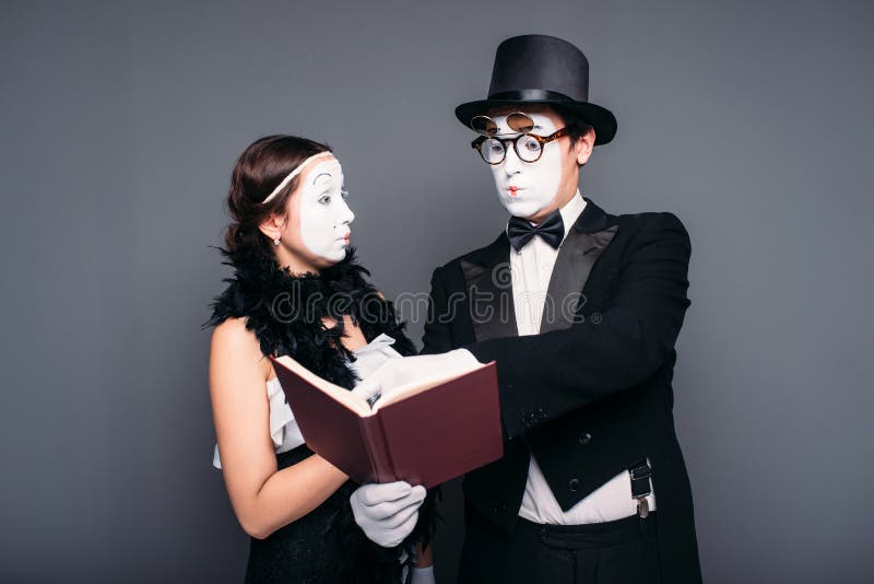 Two Pantomime Theater Performers Posing with Book Stock Photo - Image ...