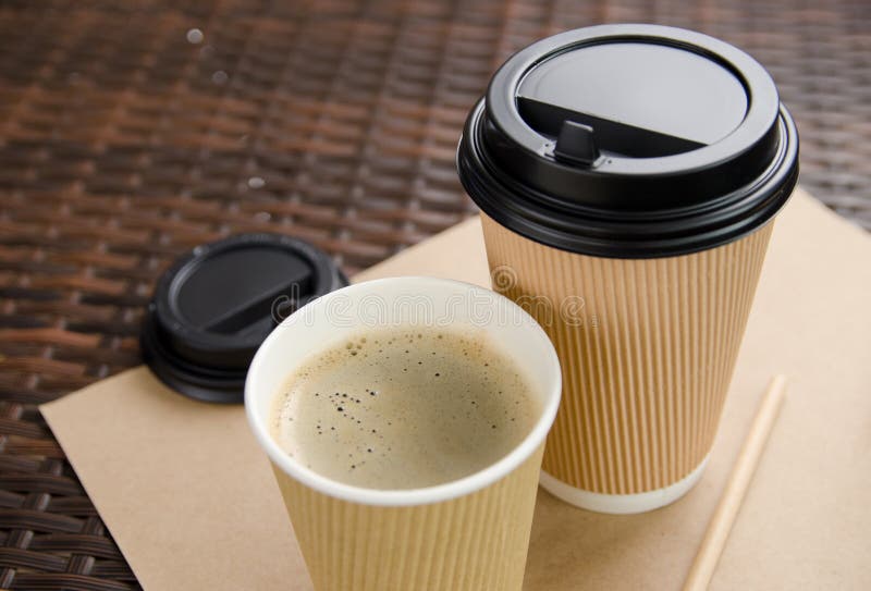 Two Paper Cups with Coffee. One of Them is Open, the Other with a Lid ...