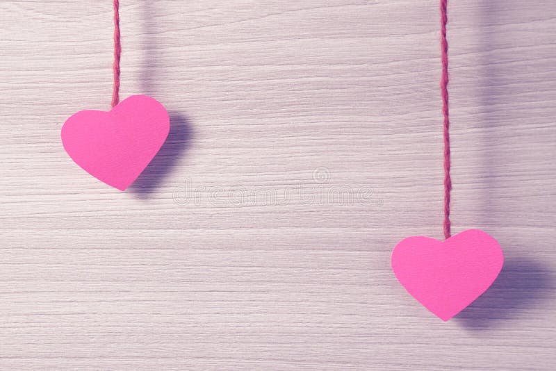Two Paper Hearts Hanging on a Rope Stock Photo - Image of copyspace ...