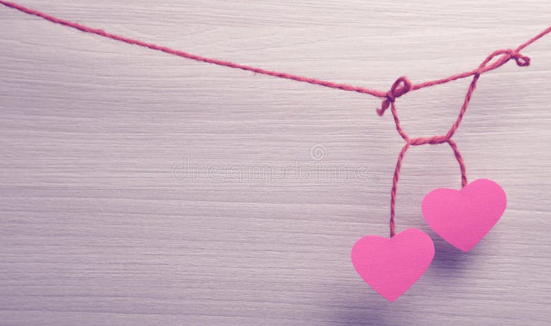Two Paper Hearts Hanging on a Rope Stock Photo - Image of space ...