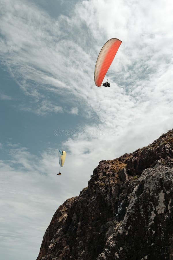 Two Paragliders Gliding Over a Cliff Stock Image - Image of dramatic ...