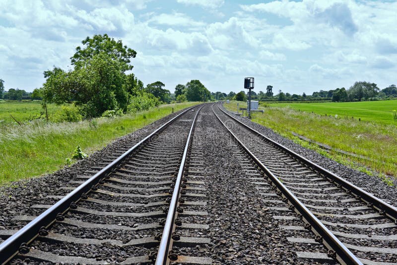 Parallel Train Tracks Next To Rail Trail Seen through Spokes of Bicycle ...