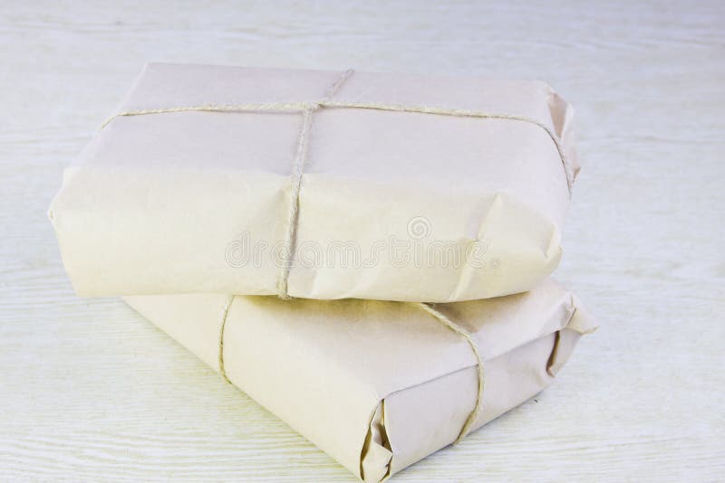Two Parcels Bandaged by a Rope Stock Photo - Image of packing ...