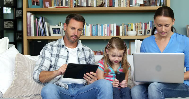 Two Parents with Her Daughter Using Technologies Stock Footage - Video ...