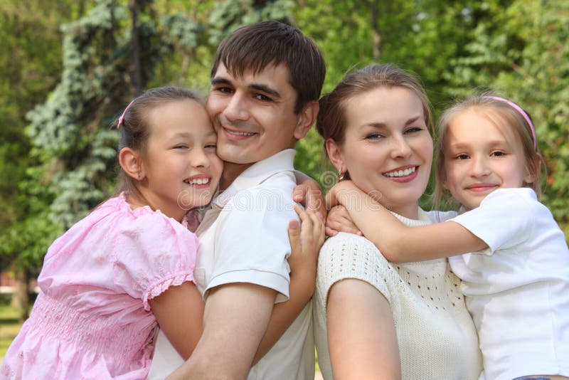 Two Parents Hold Children on Hands Stock Image - Image of caucasian ...