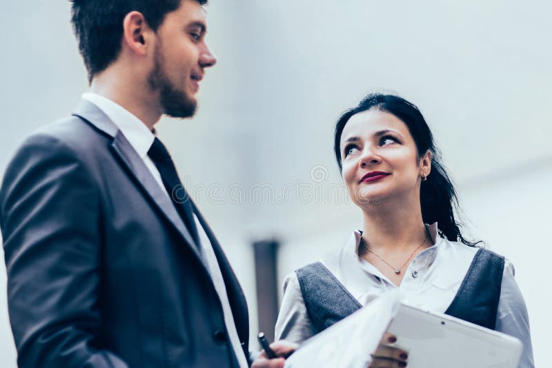 Two Partner Business Team Discussing the Latest Financial Results with ...