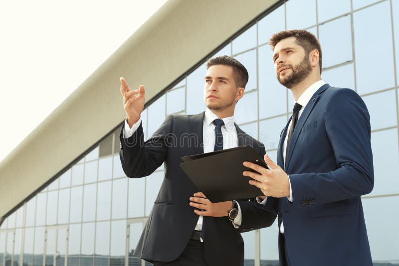 Two Partners Discussing New Project Stock Image - Image of outdoor ...