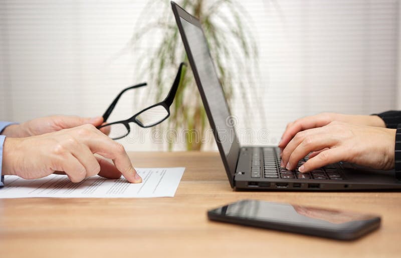 Two Partners are Examining and Reviewing Document in Office, Woman is ...