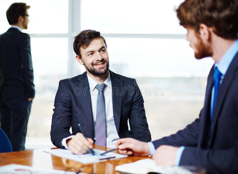 Two partners negotiating stock photo. Image of partnership - 71653414