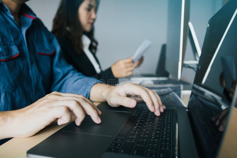 Two Partnerships Developing Programming And Coding Technologies Working On Laptop And Analyzing