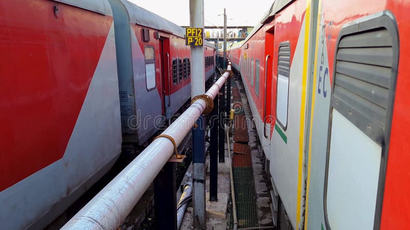 Two Passenger Train Standing at Railway Station Platform with Water ...