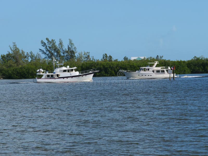 Two Passing Boats on the Ocean Stock Image - Image of watercraft ...
